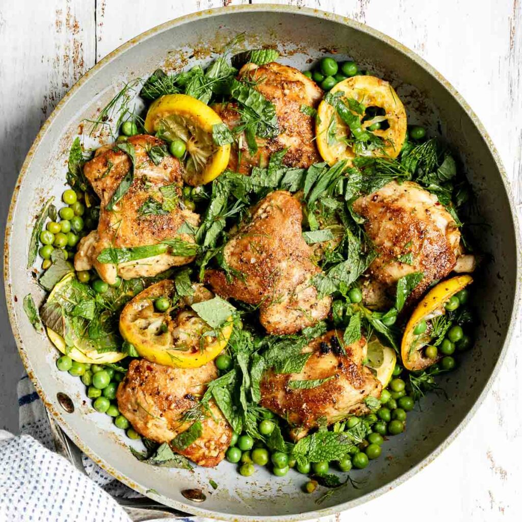 Best Chicken Thighs (Skillet Recipe with Peas and Fresh Herbs) - Eat ...