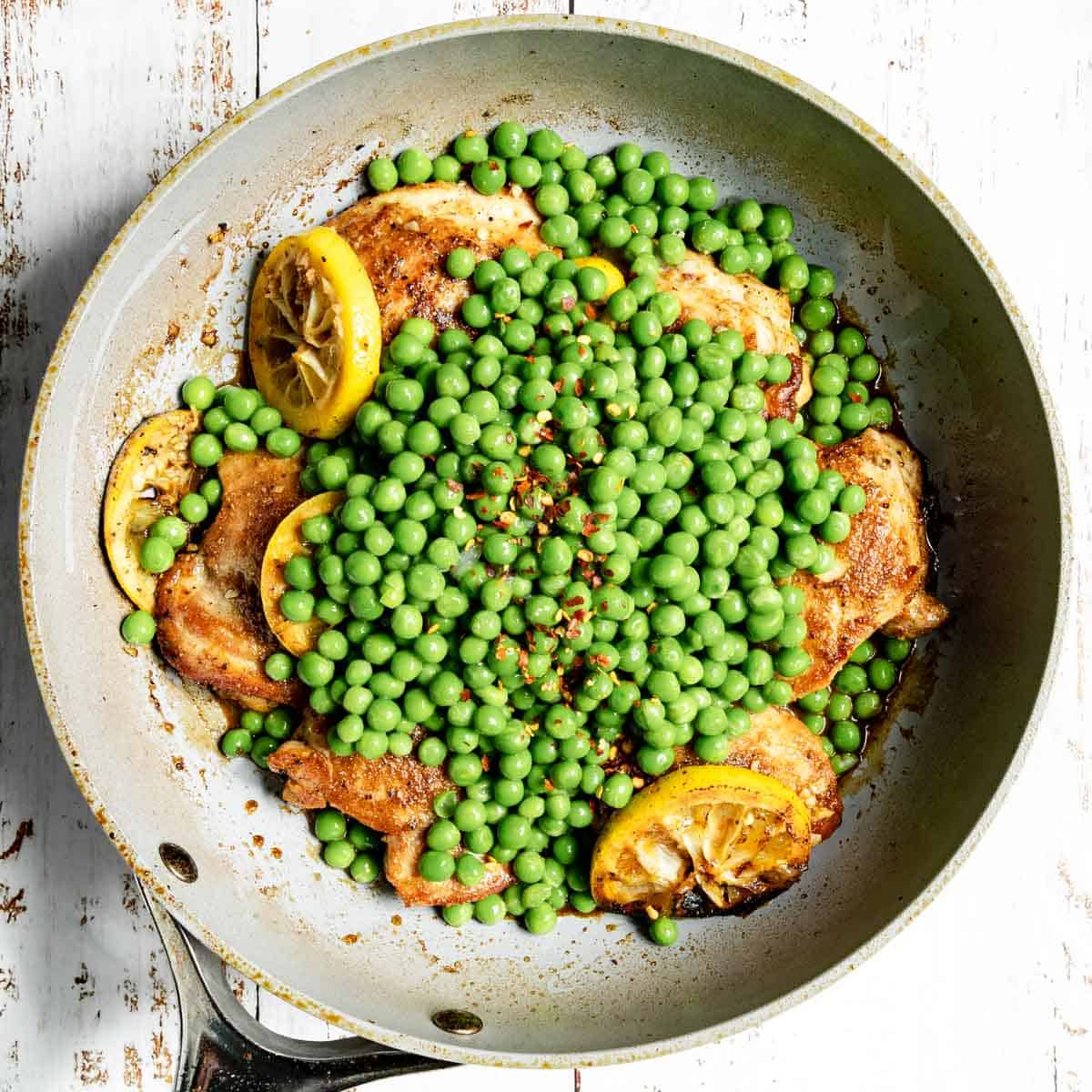 Best Chicken Thighs (Skillet Recipe with Peas and Fresh Herbs) - Eat ...